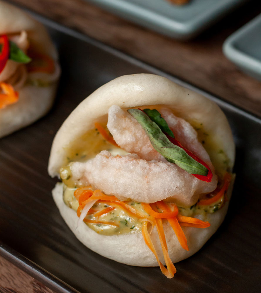 Bao with crispy fried prawn, spicy green chili mayo, pickled daikon and ...